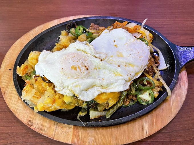 This sizzling skillet is what breakfast dreams are made of&mdash;eggs, potatoes, and veggies performing a perfect harmony under melted cheese.