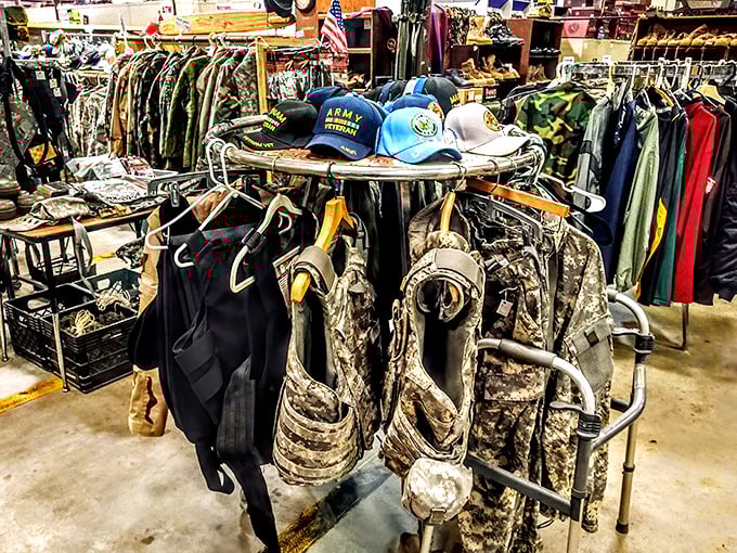Military gear and veteran caps tell silent stories of service, while the circular rack spins with history both personal and national.