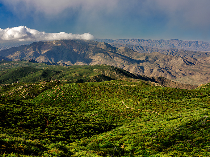 Fifty shades of green carpet these rolling hills. The kind of vista that makes you want to break into "The Sound of Music."