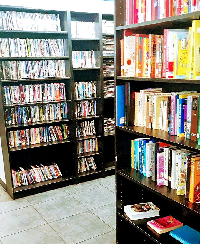 The book section: a library without late fees where dog-eared paperbacks and forgotten bestsellers wait for their second chapter with new readers.