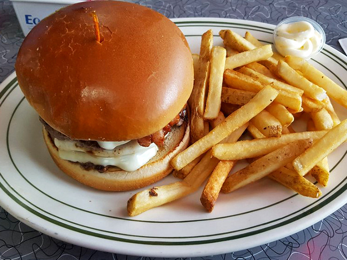 This isn't just a burger&mdash;it's a masterpiece of melty cheese, perfectly seasoned beef, and a bun that's somehow both substantial and cloud-soft.