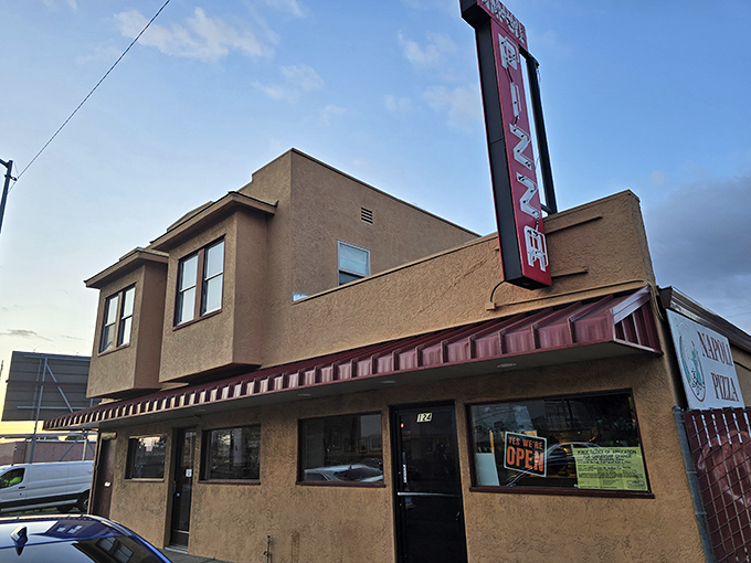 Napoli Pizzeria looks like the kind of place where they know your order before you sit down and the owner might just call your mother if you don't clean your plate.