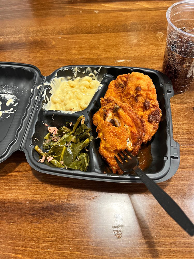 A complete meal that hits every note: savory chicken, hearty greens, and mac and cheese that would make your grandmother jealous.