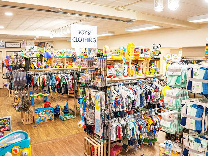 The children's section explodes with color and possibility, where toys and tiny clothes await their next adventure with a new little owner.