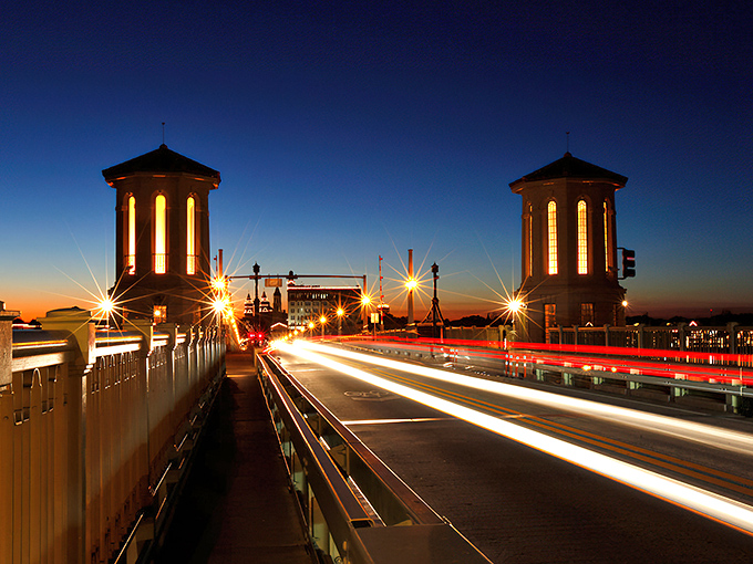 Bridge towers frame the twilight like Gothic cathedral spires, if cathedrals came with ocean views and speed limits.