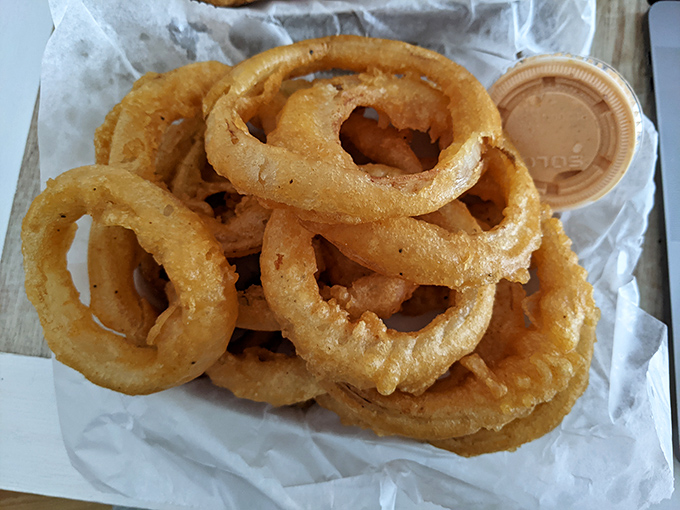 Onion rings that could double as life preservers. Crispy, golden hoops of happiness that make french fries jealous.