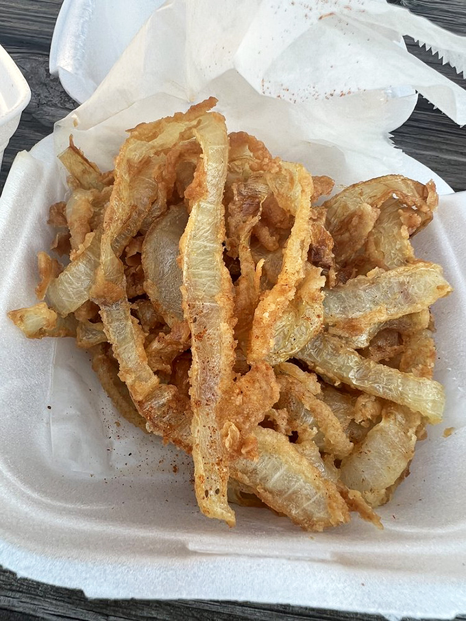 Thee Onion Thangs aren't just onion rings&mdash;they're golden halos of crispy, battered perfection that deserve their own special place in the side dish hall of fame.