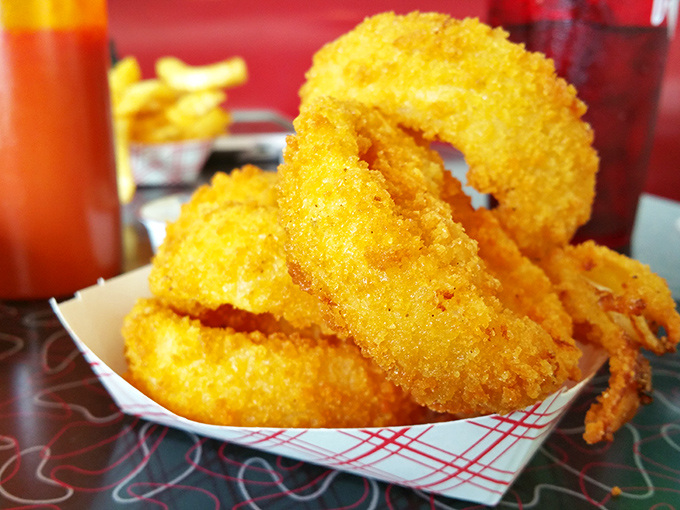These onion rings aren't just fried&mdash;they're golden halos of happiness with that perfect crunch-to-tender ratio that makes you order seconds.