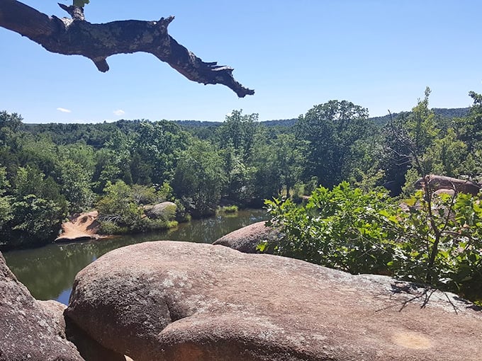 Nature's infinity pool, Missouri-style. The still water mirrors these ancient formations, doubling the visual impact of a billion years of history. 