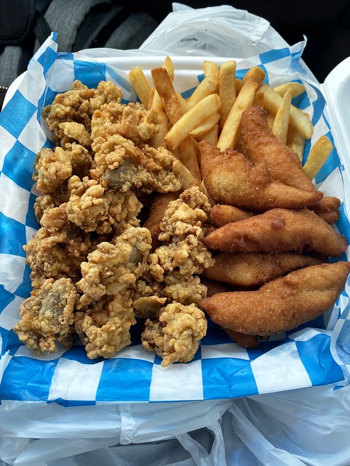 The seafood platter that makes inland folks jealous of coastal living. Fried treasures from the deep, no passport required.