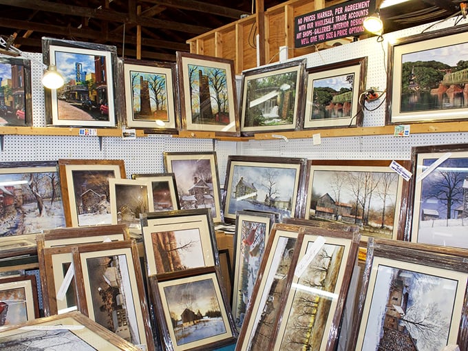 Landscapes and memories stack against each other in this art vendor's booth, where someone's discarded decor becomes another's perfect wall accent.