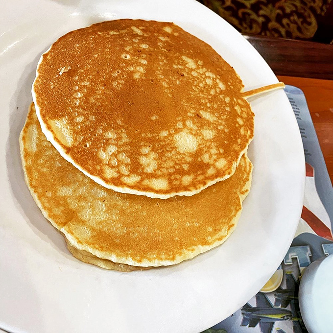 Pancakes so perfectly golden they belong in Fort Knox. Simple, unpretentious, and exactly what your inner child ordered.