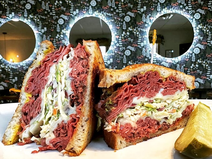 This pastrami sandwich isn't messing around—it's the heavyweight champion of lunch, with enough meat to make a carnivore weep with joy.