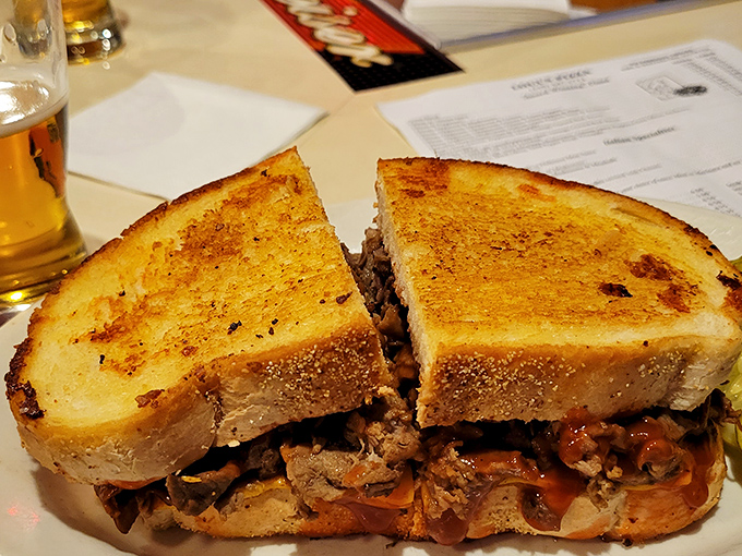 The humble patty melt: where burger meets grilled cheese in a beautiful union that reminds us why simple food endures through every culinary trend.