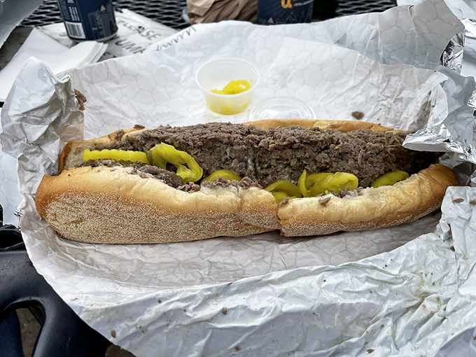 Hot peppers add a spicy rebellion to the traditional cheesesteak formula. Like adding a leather jacket to a tuxedo – unexpectedly perfect.