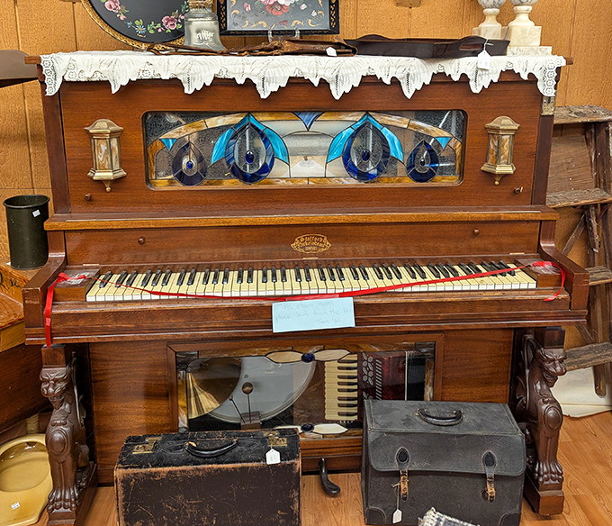 This isn't just a piano &ndash; it's a time machine with keys. The stained glass and worn ivories hint at parlor songs and family gatherings long before Netflix existed.