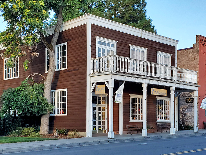 This wooden building with its welcoming porch practically whispers tales of the Old West – if only these walls could talk (they'd probably need a drink).