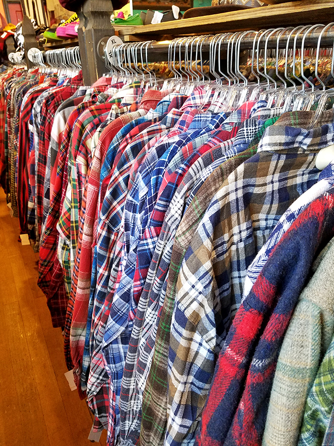 The flannel section: Portland's unofficial uniform hanging in perfect formation, like a plaid army ready to battle boring fashion choices.