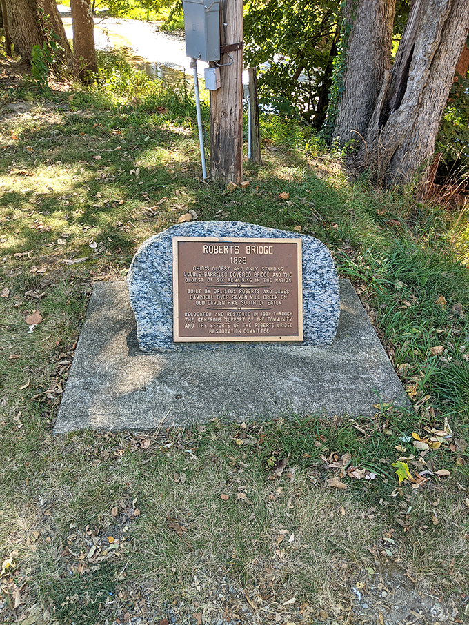 This plaque tells the bridge's story in bronze, because some tales deserve more than just pixels.