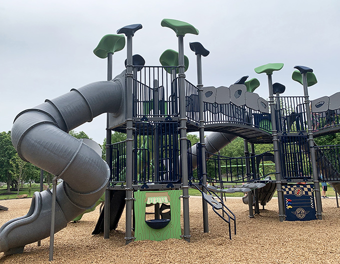 Beyond the bridge, modern playground equipment reminds visitors that Covered Bridge Park serves multiple generations, from history buffs to energy-burning toddlers.