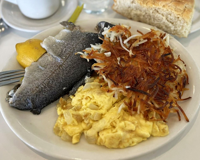 Trout and eggs with crispy hash browns—proof that breakfast in California isn't afraid to swim upstream from the ordinary.
