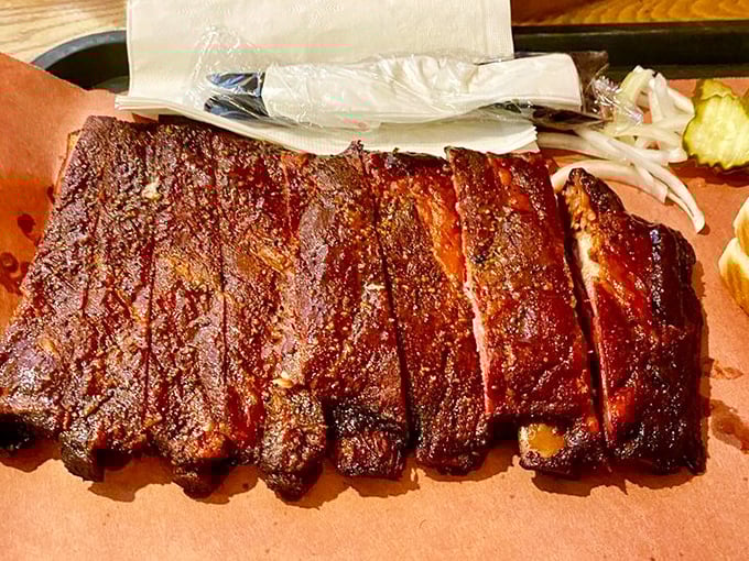 Pork ribs with a bark so beautiful it deserves its own Instagram account. That mahogany crust holds secrets only patient pitmasters understand.