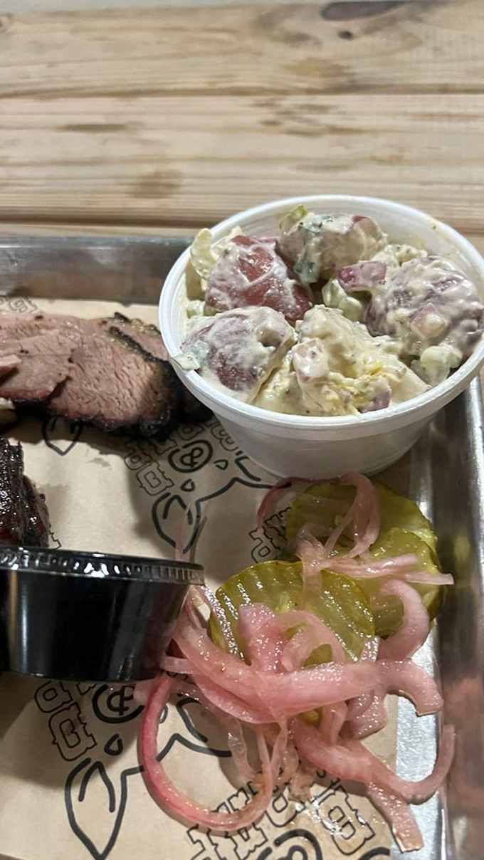 Potato salad and pickles—the unsung heroes of barbecue. These sides aren't afterthoughts; they're essential supporting characters in your meat adventure.