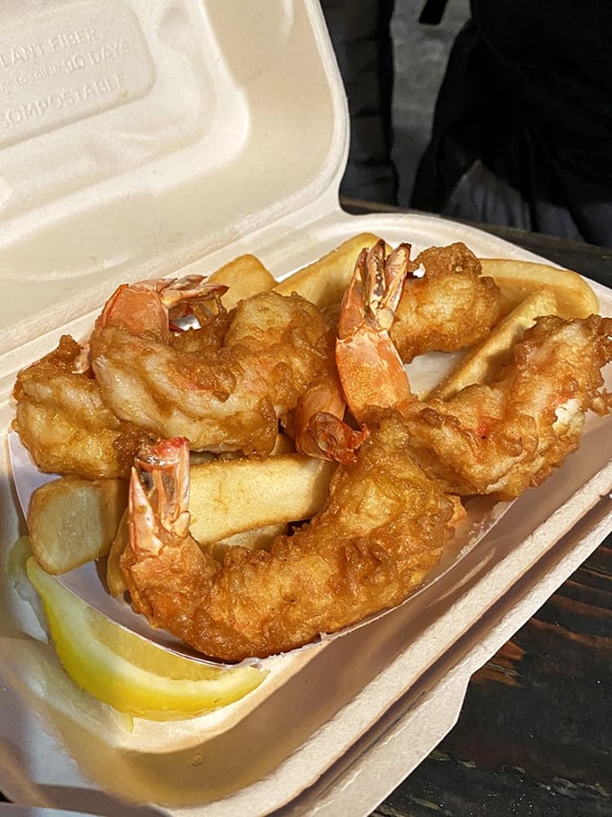 These prawns aren't just battered&mdash;they're armored in golden crispiness, ready to dive into the pool of tartar sauce on your plate.