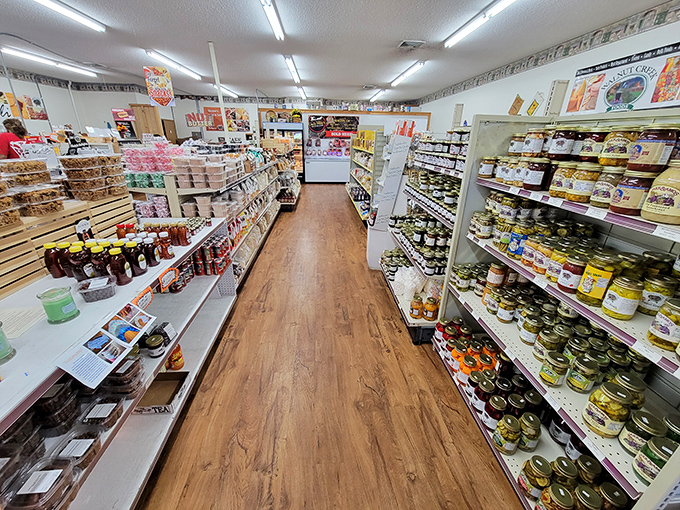 The aisle where jars of possibility line up like soldiers. Each shelf tells a story of small-batch dedication and recipes guarded like family secrets.