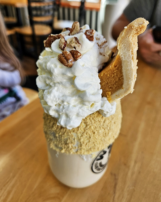 Whipped cream, candied pecans, and what appears to be pumpkin pie in drinkable form&mdash;autumn's greatest hits album in a glass.