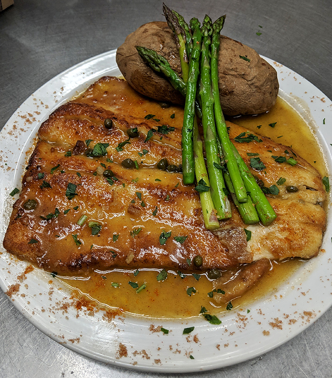 This rainbow trout with asparagus shows Westside isn't just about breakfast&mdash;their dinner game deserves its own standing ovation.