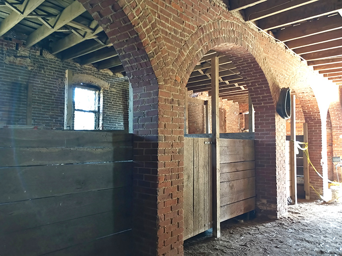 The basement reveals brick archways and hidden spaces that whisper secrets of Underground Railroad courage and determination.