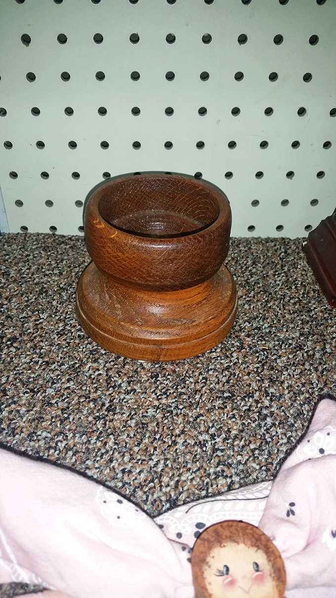 This handcrafted wooden bowl has more character than most Hollywood scripts. Someone's artistry becomes your conversation piece.