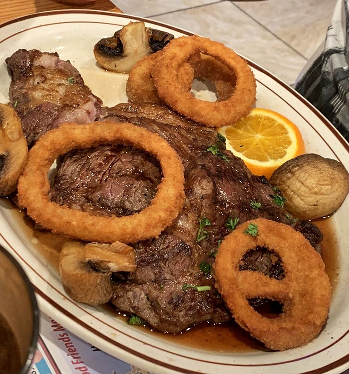 A rib-eye steak adorned with golden onion rings &ndash; proof that diners can deliver steakhouse quality without the steakhouse attitude.