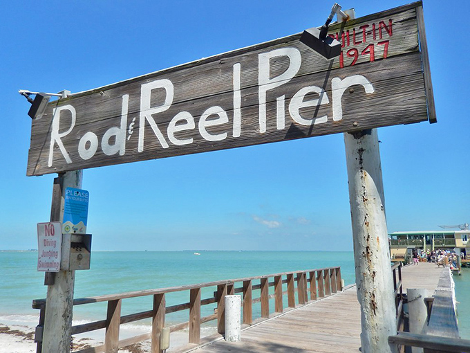The weathered Rod & Reel Pier sign has directed generations of anglers and diners to one of Anna Maria's most beloved landmarks.