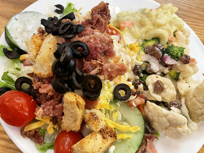 This isn't just a salad&mdash;it's a colorful rebellion against boring greens, loaded with bacon, cheese, olives and enough toppings to make vegetables exciting again.