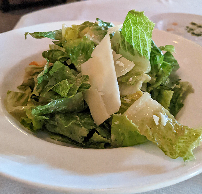 A Caesar salad that reminds you vegetables can be more than an obligation. Those shavings of parmesan are like little flavor lottery tickets.