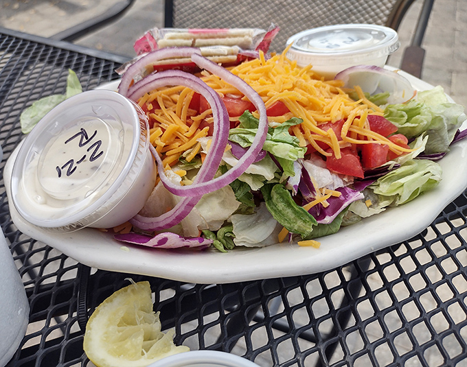 A garden-fresh salad for when you want to pretend you're being virtuous before ordering that slice of pie. Those vibrant colors practically scream "Florida sunshine."