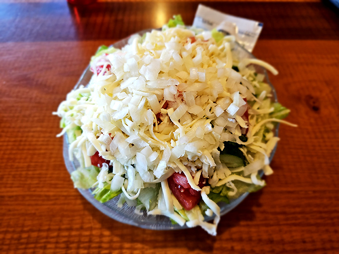 Even the salads here refuse to be boring &ndash; that mountain of cheese says "diet starts tomorrow."