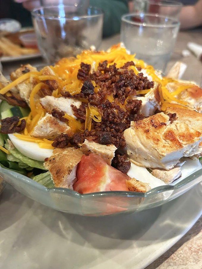A chef's salad that actually satisfies. This isn't rabbit food &ndash; it's a protein-packed masterpiece topped with enough cheese to make a cardiologist nervous.