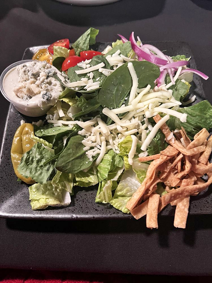 Even the house salad gets the star treatment here&mdash;fresh greens, vibrant veggies, and those crispy tortilla strips adding the perfect crunch factor.