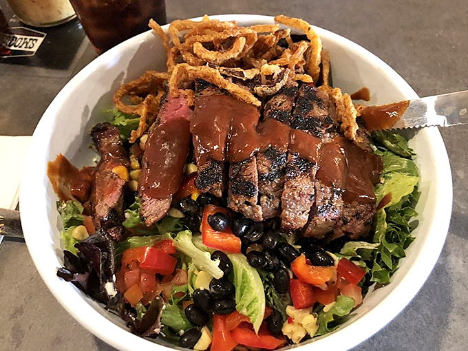 Even the salad gets the royal barbecue treatment here, proving vegetables can play nicely with serious smokehouse credentials.