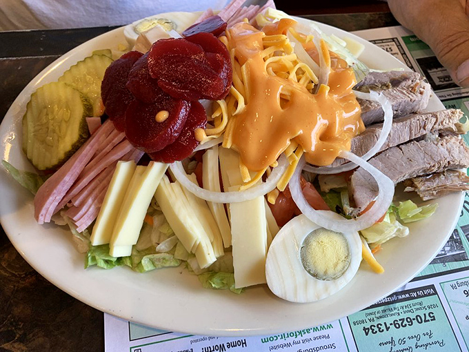 A chef's salad that doesn't know the meaning of "portion control"&mdash;a mountain of protein, cheese, and vegetables that requires strategic eating.