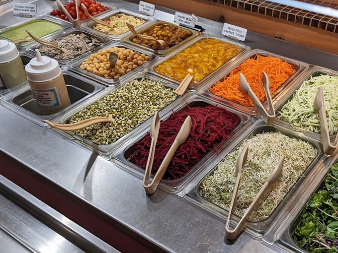 A rainbow of fresh ingredients awaits your creative assembly. From sprouts to shredded beets, this salad bar is where healthy eating becomes an art form.