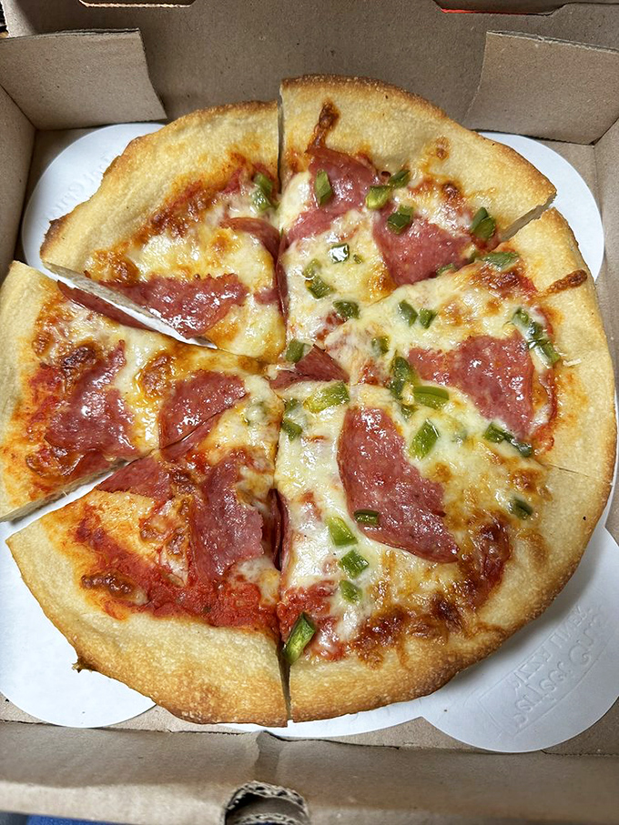 This pizza strikes the perfect balance between meat and vegetable—like a delicious peace treaty between your cravings and your conscience.