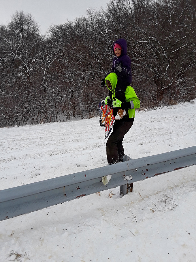 Winter transforms the park into a snow-covered playground where sledding becomes an Olympic-worthy sport for all ages.