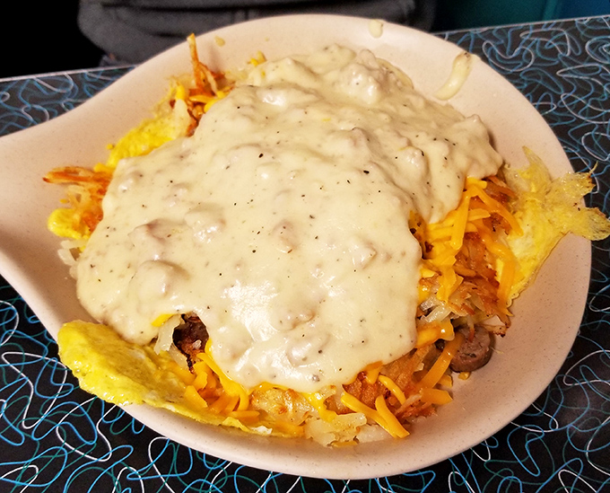 Behold the breakfast bowl&mdash;where hash browns, eggs, cheese, and sausage gravy unite in holy matrimony. Morning fuel that could power you through building a barn.