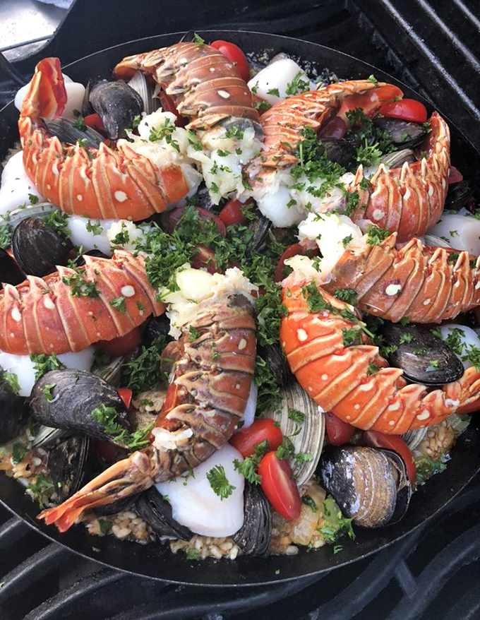 A seafood paella that looks like it should have its own ZIP code&mdash;a neighborhood of lobster tails, mussels, and clams living harmoniously on a bed of saffron-kissed rice.