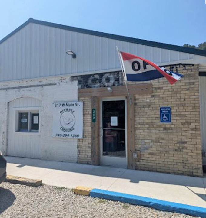 Small-town Ohio pride flies high outside the Shawnee Crossing. Sometimes the most authentic experiences come in the most unassuming packages.