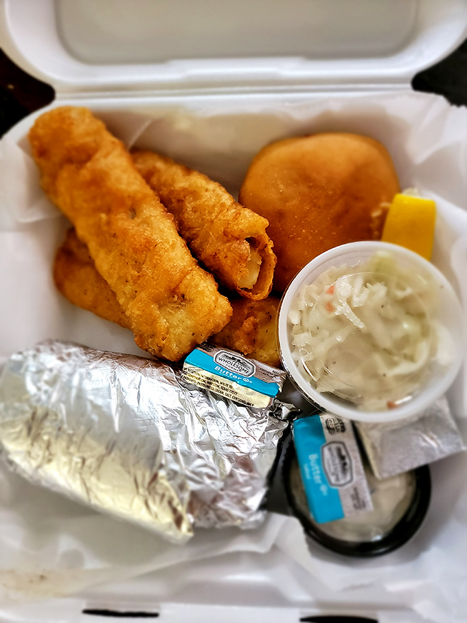 Fish so fresh it might still be telling tales from the lake, paired with crispy companions that make takeout feel like a special occasion.